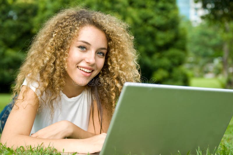 Laptop Outside stock photo. Image of smiling, grass, hair - 5051794