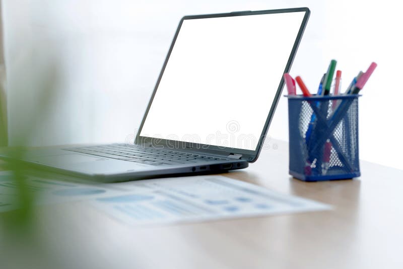 Laptop and Papers on Desk in Front of Window Stock Image - Image of ...