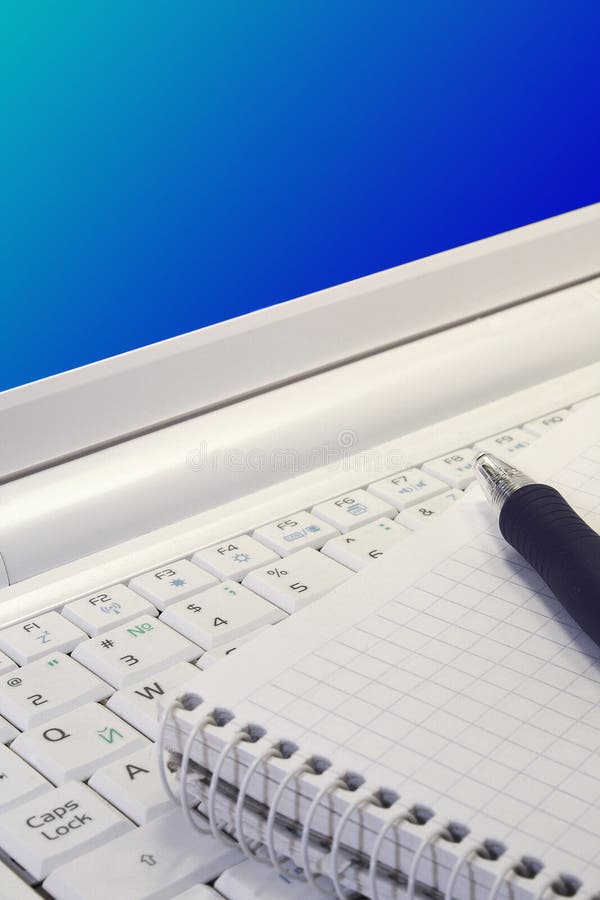 Laptop and pen stock photo. Image of paper, white, laptop - 22385200
