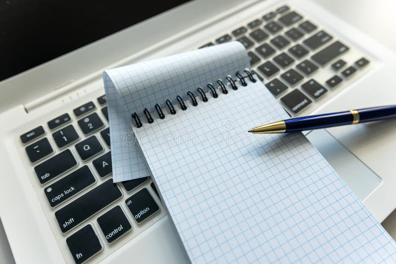 Laptop Pen with Blank Empty Notepad in Office Desk. Stock Image - Image ...