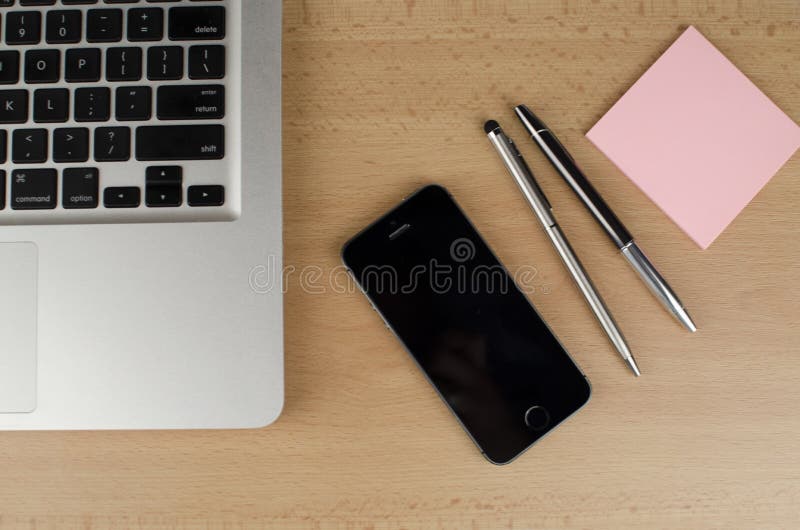 Laptop, phone and notes stock image. Image of device - 84960179