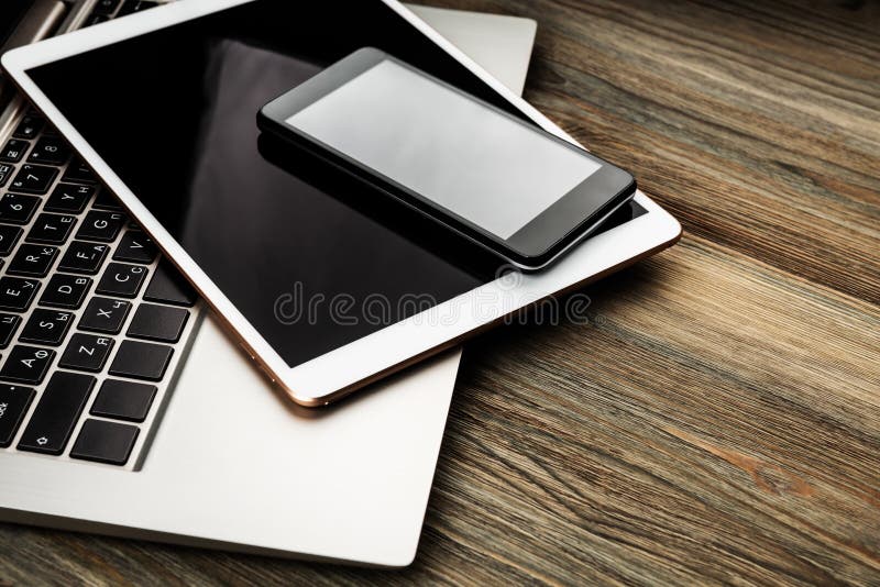 Laptop with Phone and Tablet Pc Stock Photo - Image of contemporary ...