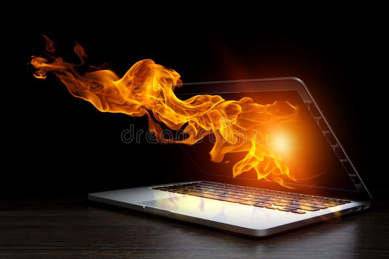 Laptop in fire flames stock image. Image of keyboard - 32884321