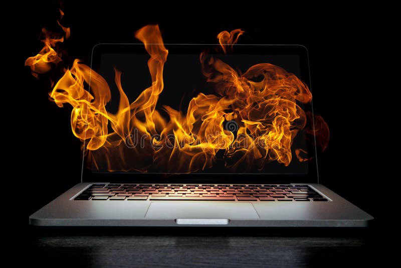 Laptop in fire flames stock image. Image of keyboard - 32884321