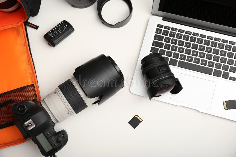 Laptop and Professional Photographer`s Equipment on Table Stock Image ...