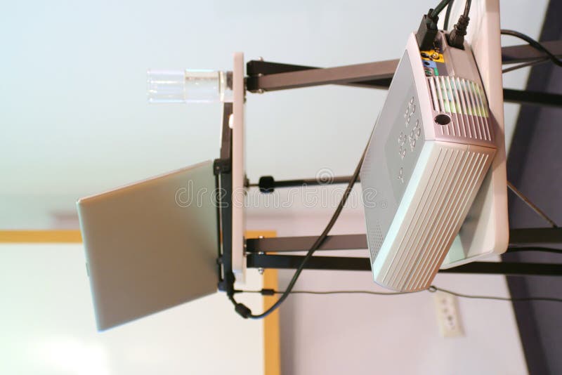 Laptop with projector stock photo. Image of corporate - 1290402