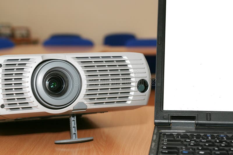 Laptop with Computer Projector on Table Stock Photo - Image of digital ...