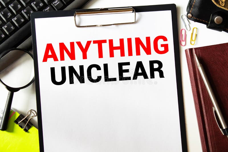 ANYTHING UNCLEAR Text On Paper Sheet With Chart, Dice, Spectacles, Pen ...