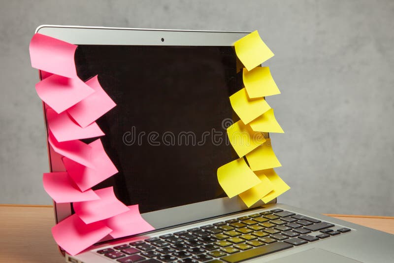 Laptop in Reminders of Yellow Stickers in the Form of Question Mark ...