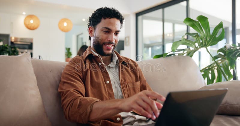 Laptop, Remote Work and Smile with Man on Sofa in Living Room of Home ...