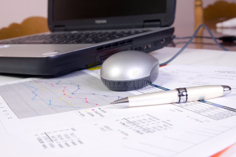 Laptop and reports writing stock image. Image of business - 12454127