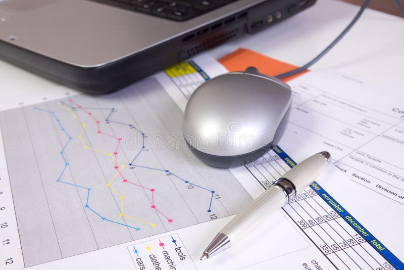 Laptop and reports stock photo. Image of budged, sales - 12453952