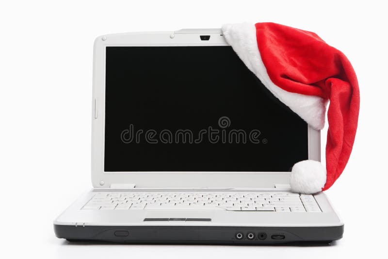 Laptop and Santa hat stock image. Image of screen, monitor - 12126685