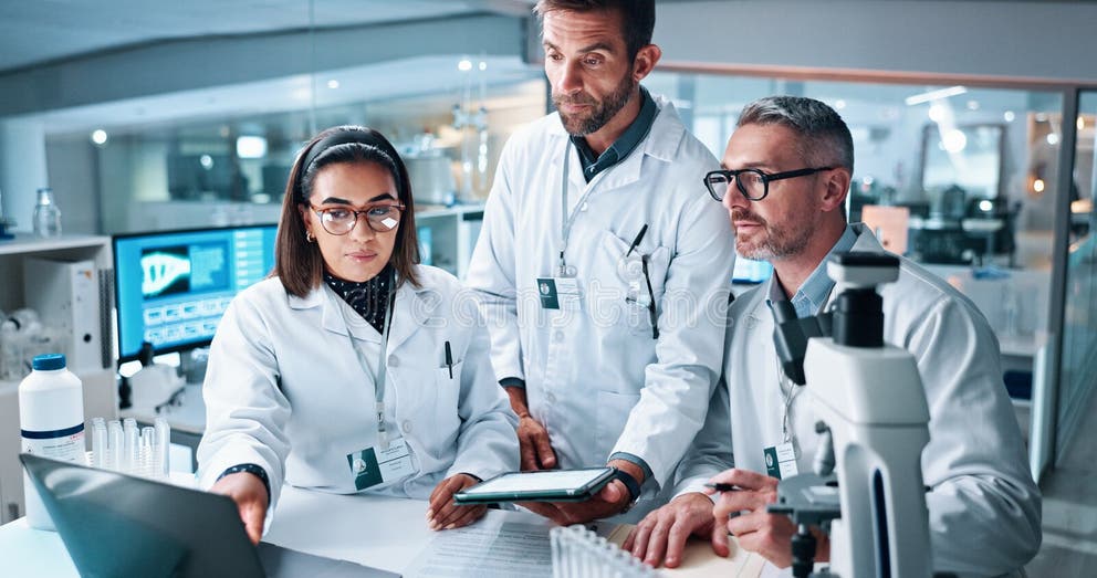 Laptop, Science and Tablet with People in Laboratory Together for ...