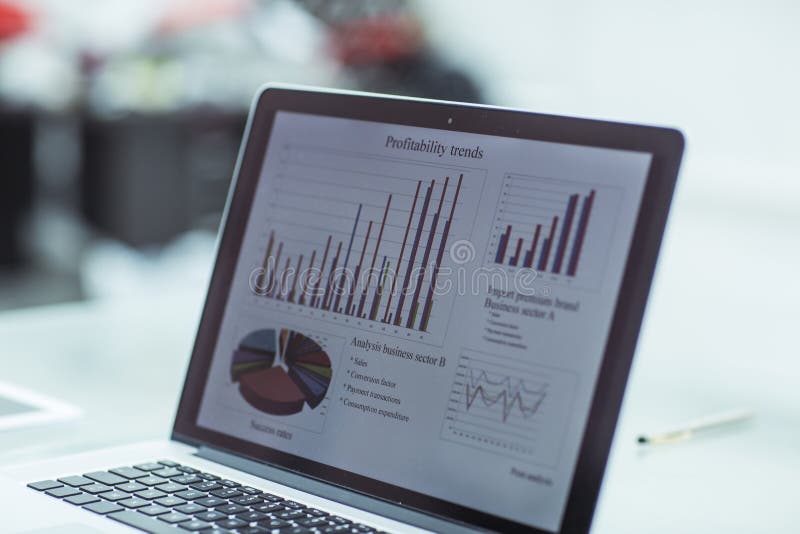 Laptop Screen with Financial Chart on a Workplace of the Businessman ...
