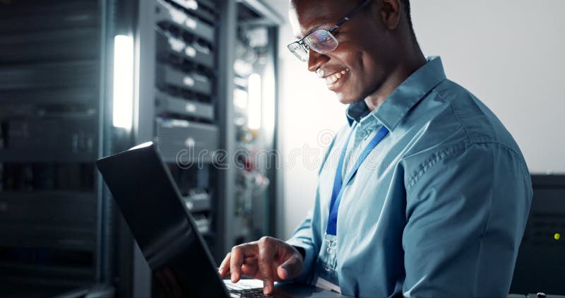 Laptop Server Room And Black Man On Database Network For Maintenance Programming Software Or