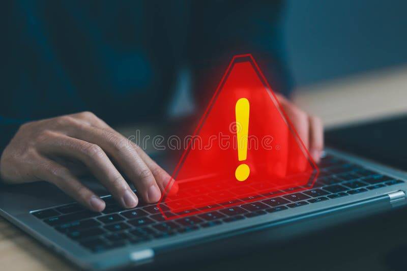 Laptop Shows a Warning Sign of System Failure. Concept Notification a ...