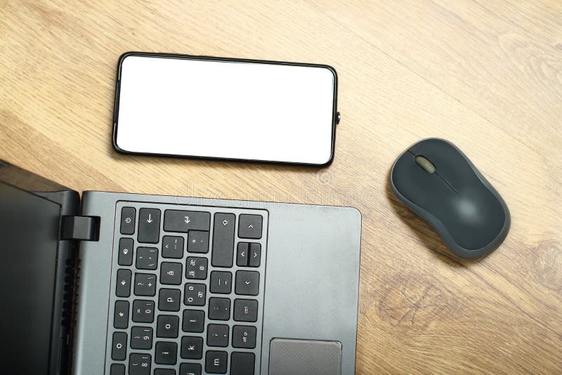 Laptop with Smartphone and Computer Mouse on Boards Stock Photo - Image ...