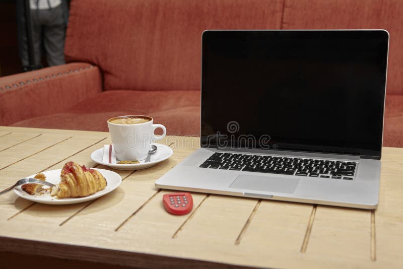 Laptop and Snack on Cafe`s Table Editorial Photo - Image of coffee ...