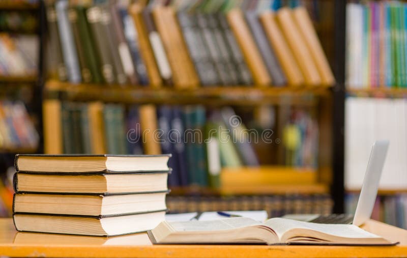 Laptop and a Stack of Books in the Library Stock Image - Image of learn ...