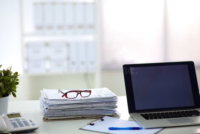 Laptop with Stack of Folders on Table on White Stock Photo - Image of ...