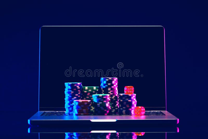 Laptop with Stacks of Poker Chips on Green Felt Stock Photo - Image of ...
