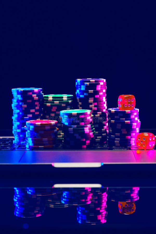 Laptop with Stacks of Poker Chips on Green Felt Stock Image - Image of ...