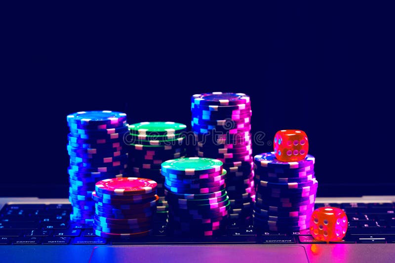 Laptop with Stacks of Poker Chips on Green Felt Stock Image - Image of ...