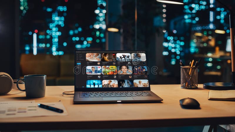 Laptop Standing on a Desk with a Video Streaming Platform Displayed on ...