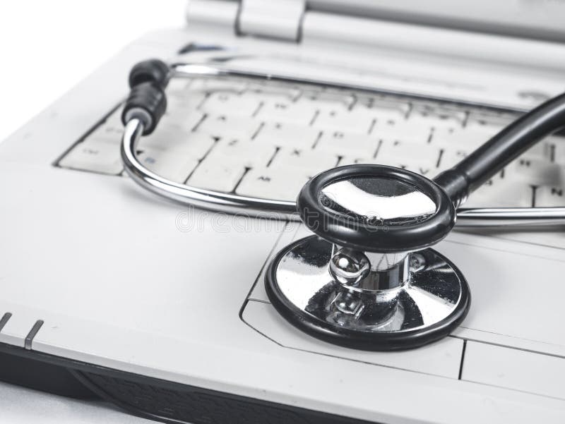 Laptop with Stethoscope stock photo. Image of business - 127248486