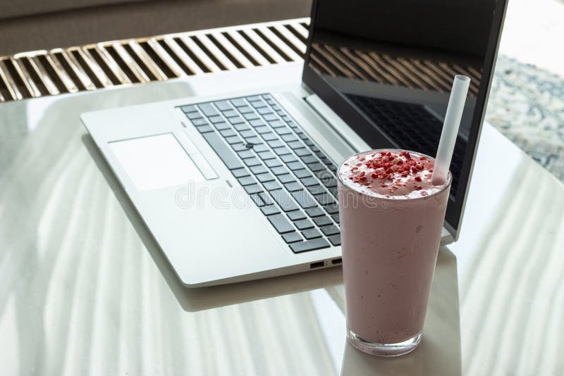 A Laptop and a Strawberry Cocktail are on the Table, Freelance Concert ...