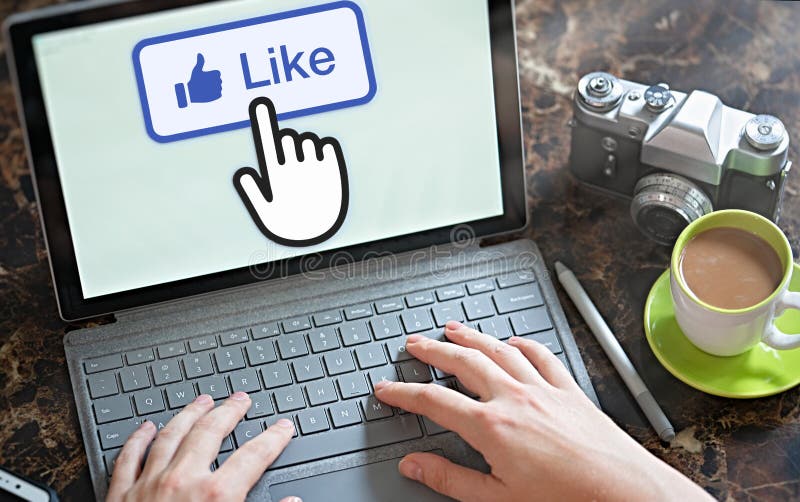 Laptop on the Table , Like Icon on the Screen Editorial Stock Photo ...