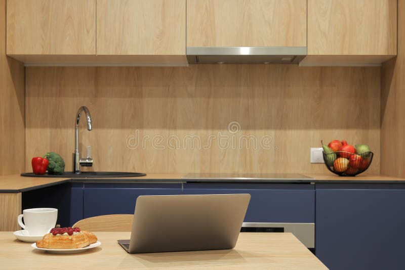 Laptop on the Table in the Kitchen Stock Image - Image of people ...
