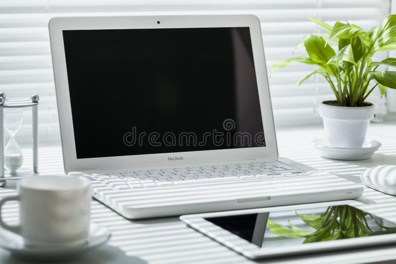 Laptop on table editorial photography. Image of design - 119337562