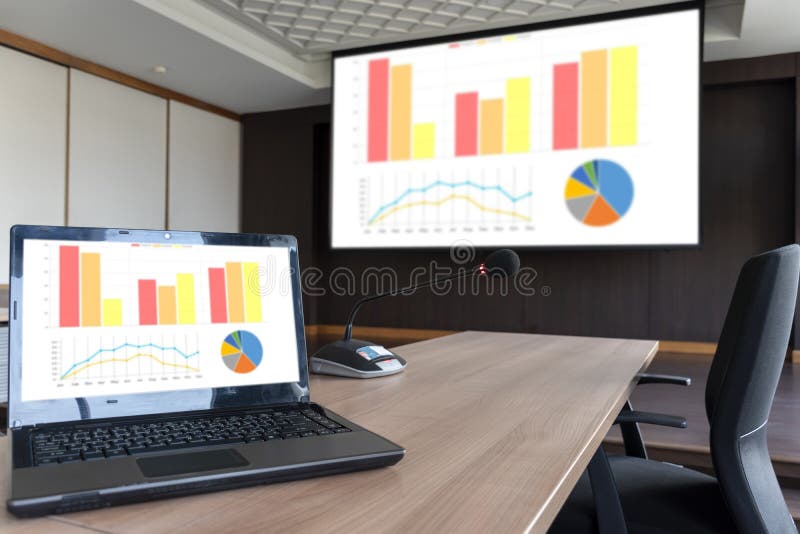 Laptop on Table and Srceen with Presentation Meeting in Meeting Room ...