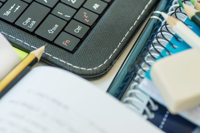 Laptop Tablet Keyboard Opened Textbook Pencil Stack of Notebooks Pen on ...