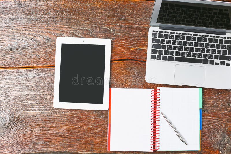 Laptop and Tablet Lie on a Wooden Table Stock Image - Image of business ...