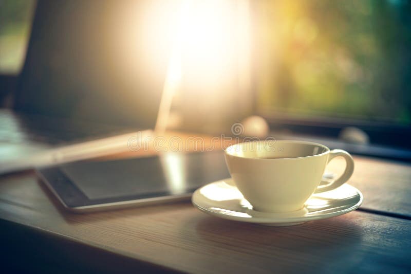 Laptop Tablet and White Coffee Cup on Wooden Table Stock Photo - Image ...