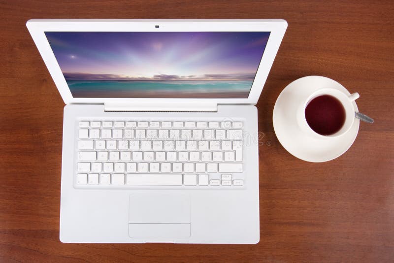 Laptop and tea coffee stock photo. Image of macbook, spoon - 22496640