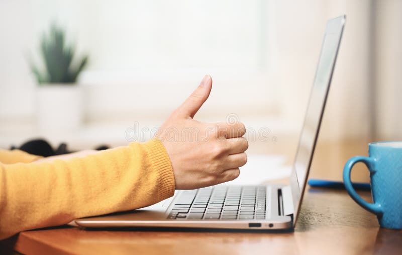 Laptop with a Thumb Up Hand at Home or Office Desk Stock Image - Image ...