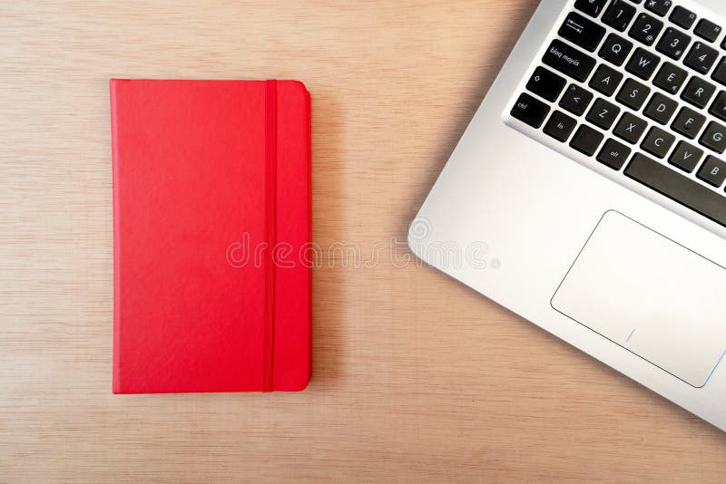 Laptop on Wooden Desk with a Red Notebook, Flat Lay, Top View ...