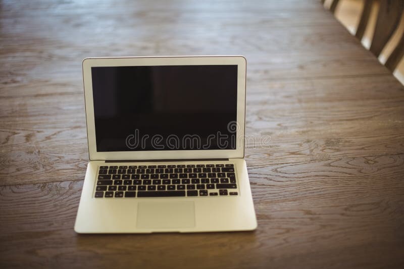 Laptop on wooden floor stock photo. Image of pattern - 95504734