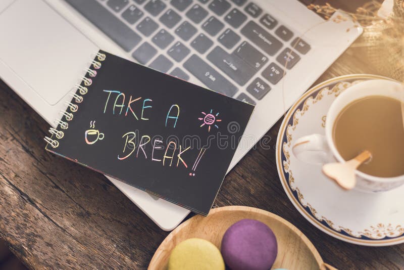Laptop on Wooden Table with Coffee and Take a Break Note Stock Photo ...