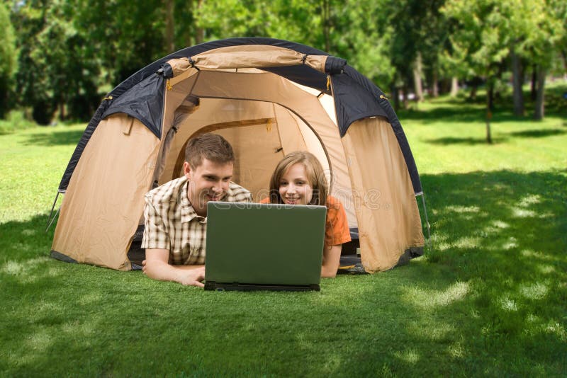 Camping with Laptop by Lake Stock Photo - Image of camping, nature ...