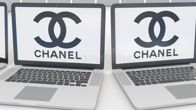 Laptops with Chanel Logo on the Screen. Computer Technology Conceptual ...