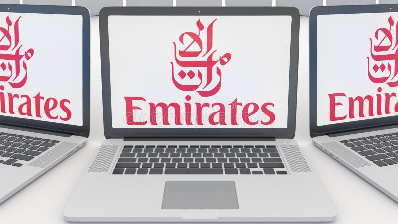 Laptops with Emirates Airline Logo on the Screen. Computer Technology ...