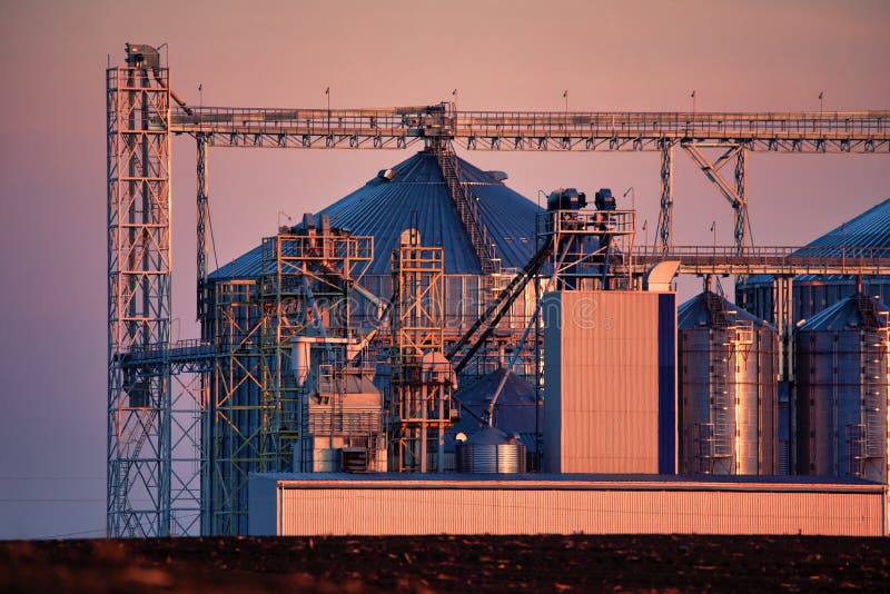 Large Agricultural Grain Processing Plant at Sunset Stock Photo - Image ...