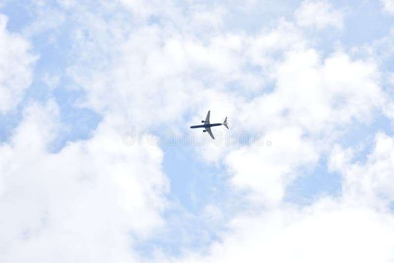 Large Airplane Flying among the Clouds Editorial Stock Photo - Image of ...
