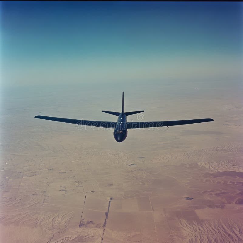 A Large Airplane Flying Over a Desert Plain Stock Photo - Image of ...