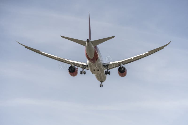 A Large Airplane with the Landing Gear Deployed Performing Approach ...